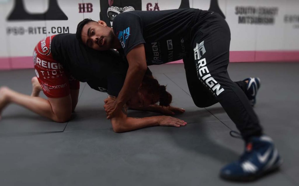 Learn how to do the Front Headlock - The Official Website of Cristiane ...